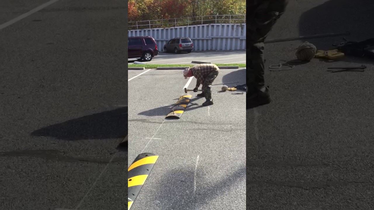 Rubberized Speed Bump Installation | Asphalt & Concrete Contractors in ...
